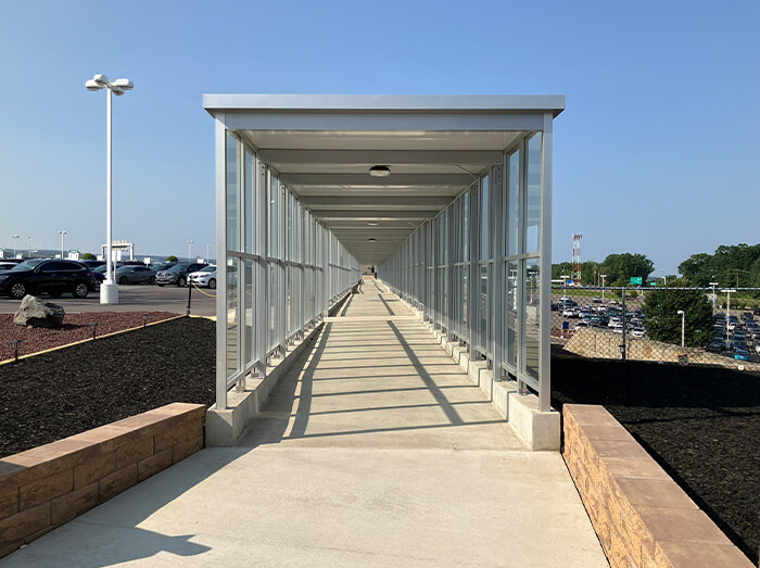 Specialized Covered Walkway Design for Airports | Austin Mohawk